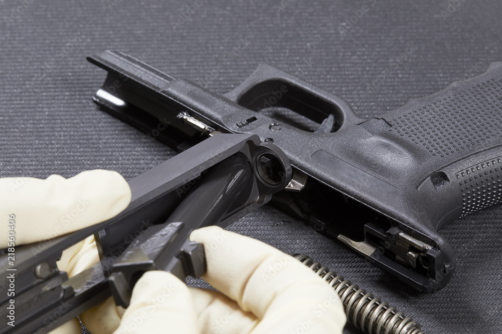 Disassembling a Pistol Stock Photo | Adobe Stock