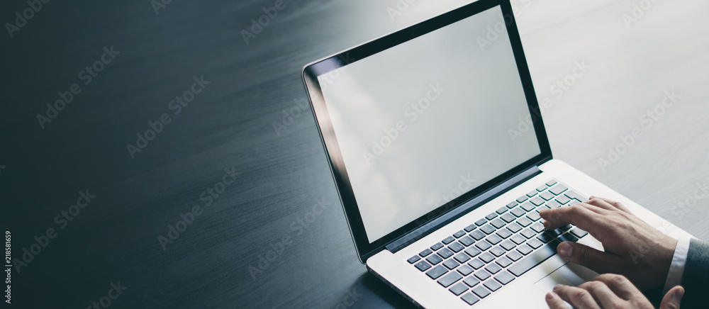 Man with laptop. Mockup of the screen Stock Photo | Adobe Stock