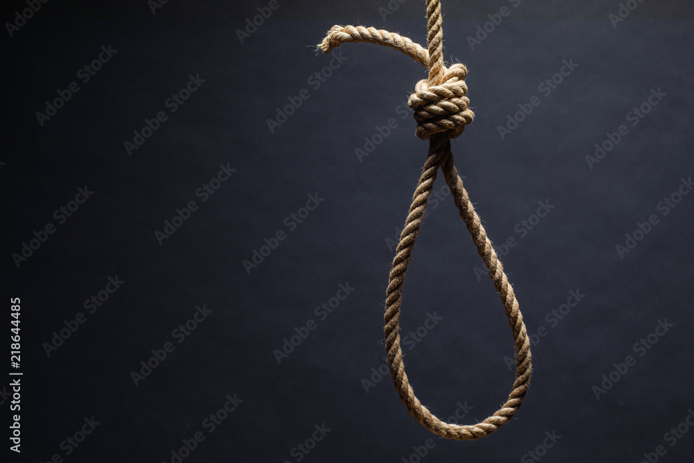 Noose. The concept of murder or suicide. On dark background Stock Photo ...