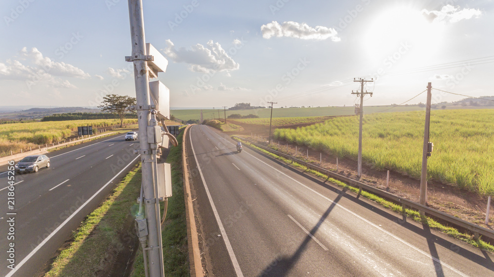 Traffic radar with speed enforcement camera in a highway. Automatic ...