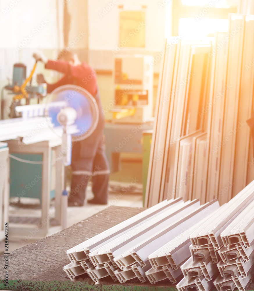 Production of PVC windows, the worker makes a PVC window, pvc frame ...