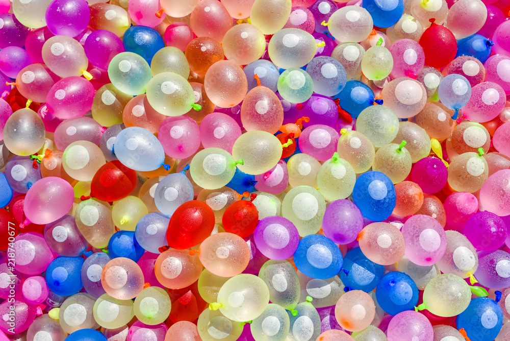 Colorful balloons filled with water. Texture of colorful balloons ...
