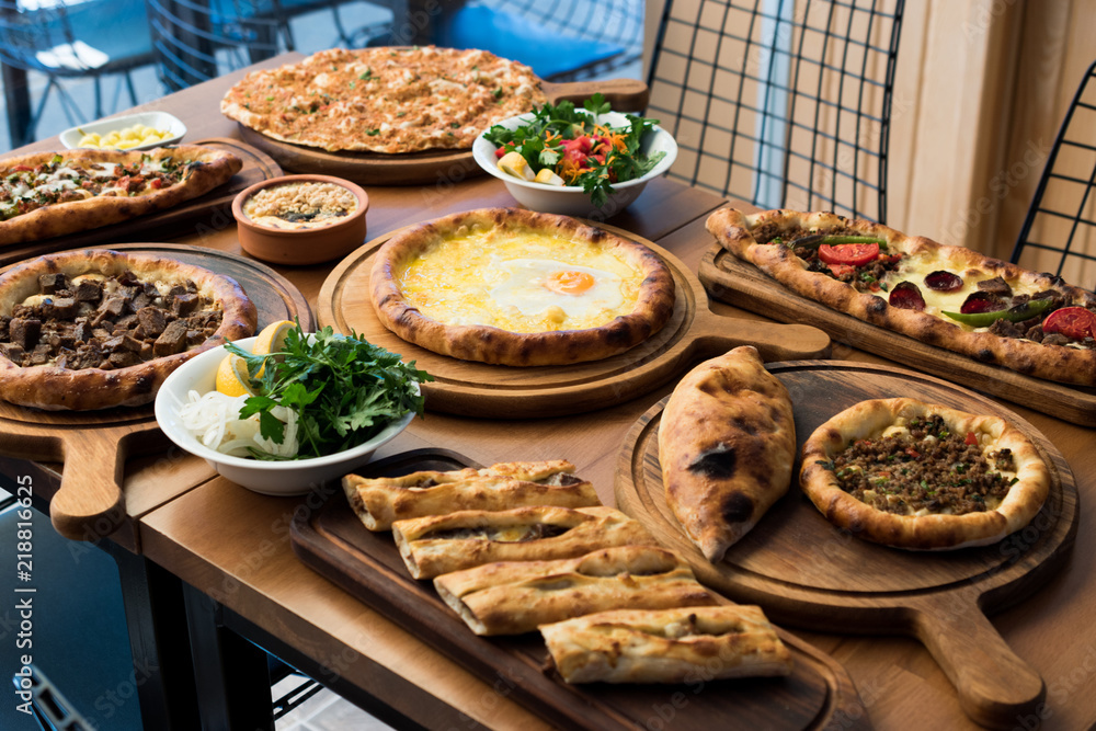 Variety of Turkish Pide Traditional food with beef, Cheese, Fried Egg ...