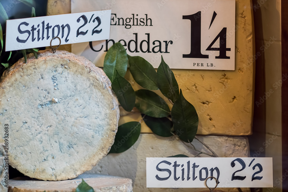 Vintage cheese shop mock-up. Old English stilton and cheddar display ...