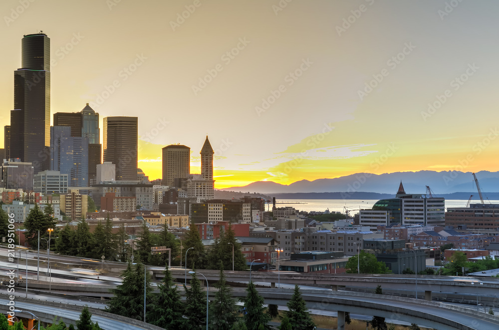Seattle skylines and s-curved I-90, I-5 highway interchange traffic ...