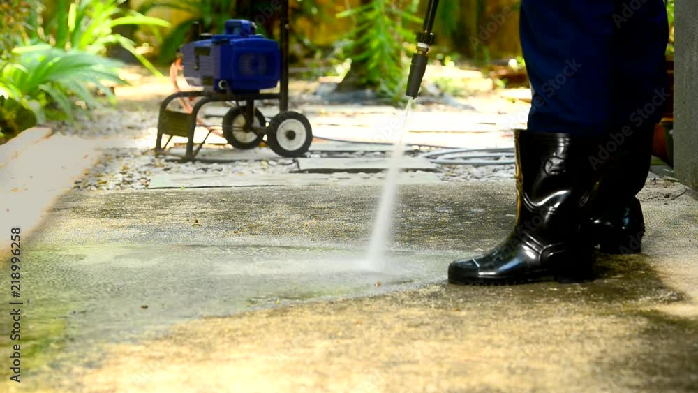 High pressure cleaning, lower body with waterproof boots. Worker ...