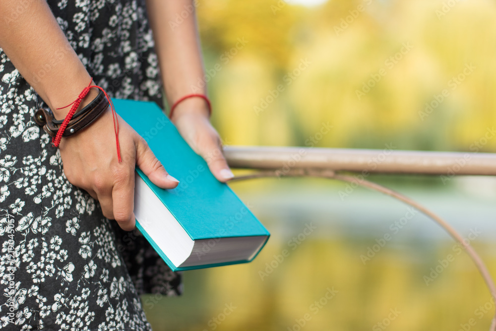 vintage hipster people concept of blue book with empty cover in young ...