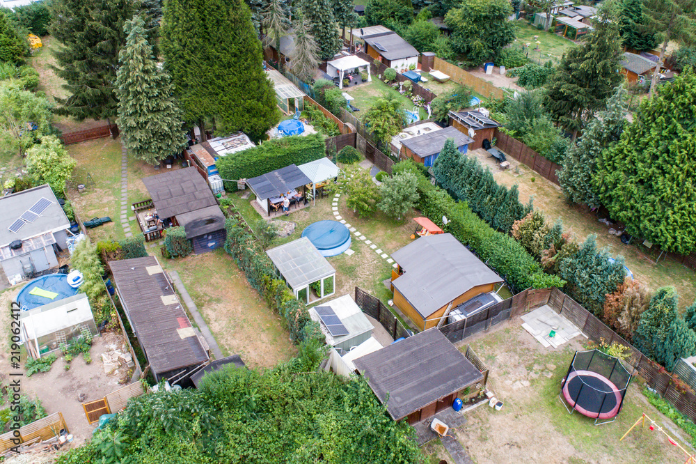 Aerial photo with the drone, a new build-up plot with single houses and ...