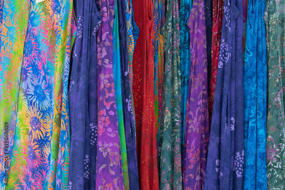Colorful dresses and clothes as a background. Stock Photo | Adobe Stock