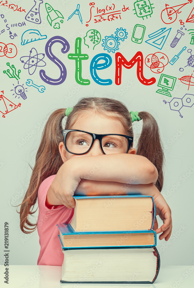 STEM word and symbols over beautiful cute little girl with thick books ...