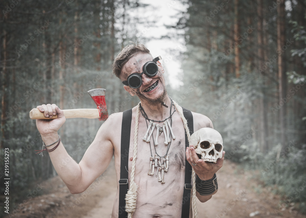 Cannibal Man in glasses with ax, skull and rope Stock Photo | Adobe Stock