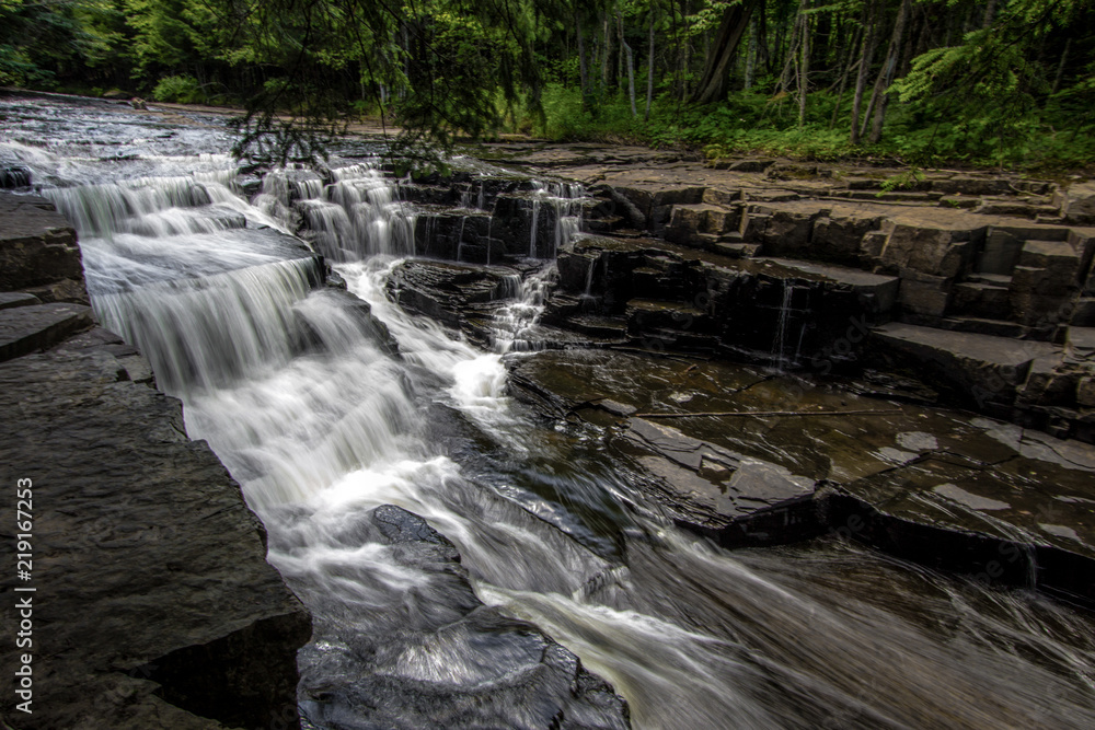 Scenic Michigan Waterfall Landscape. Beautiful Quartzite Falls flows ...