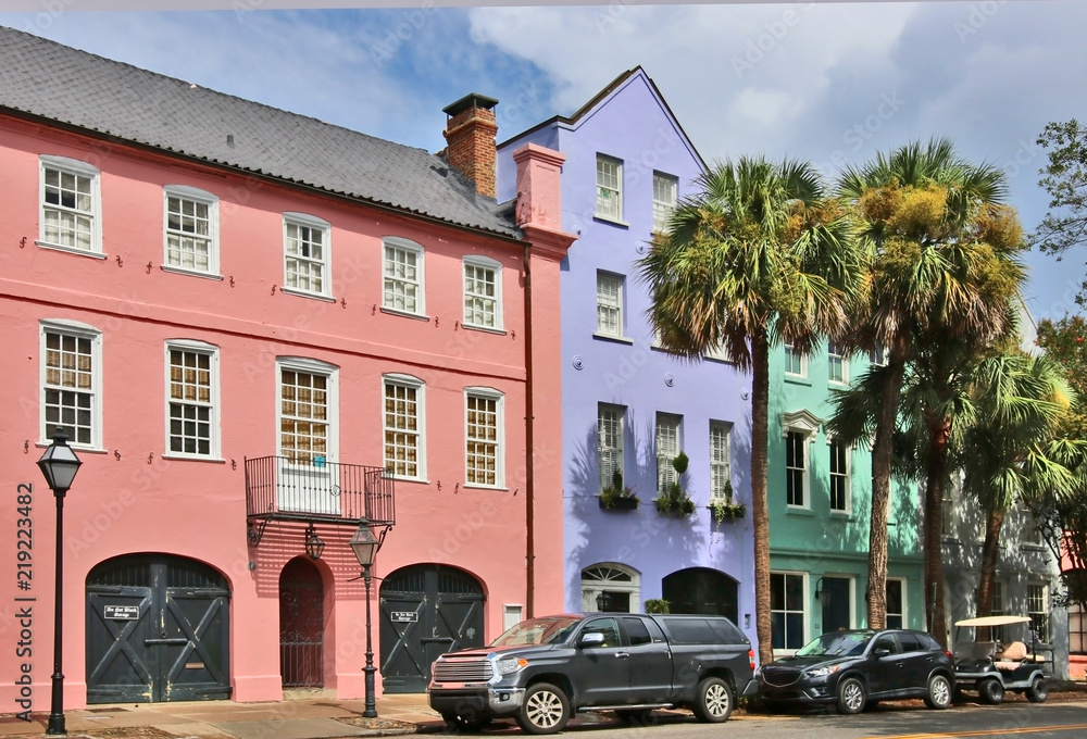 Street view with row of colorful buildings in the historic downtown ...