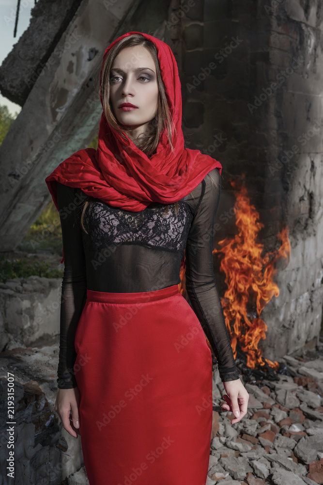 Beautiful Fashion Model Girl Wearing A Red Long Skirt And A Red Shawl