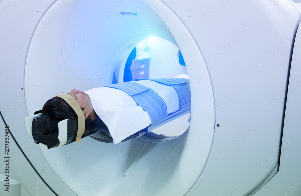 Process of CT scanning of an old patient. Man Receiving a Medical Scan ...