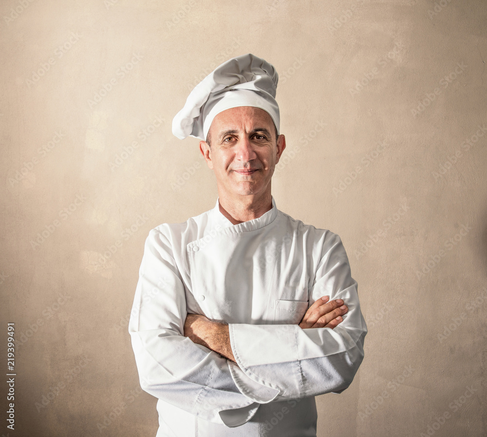 cuoco sorridente su fondo vintage Stock-Foto | Adobe Stock