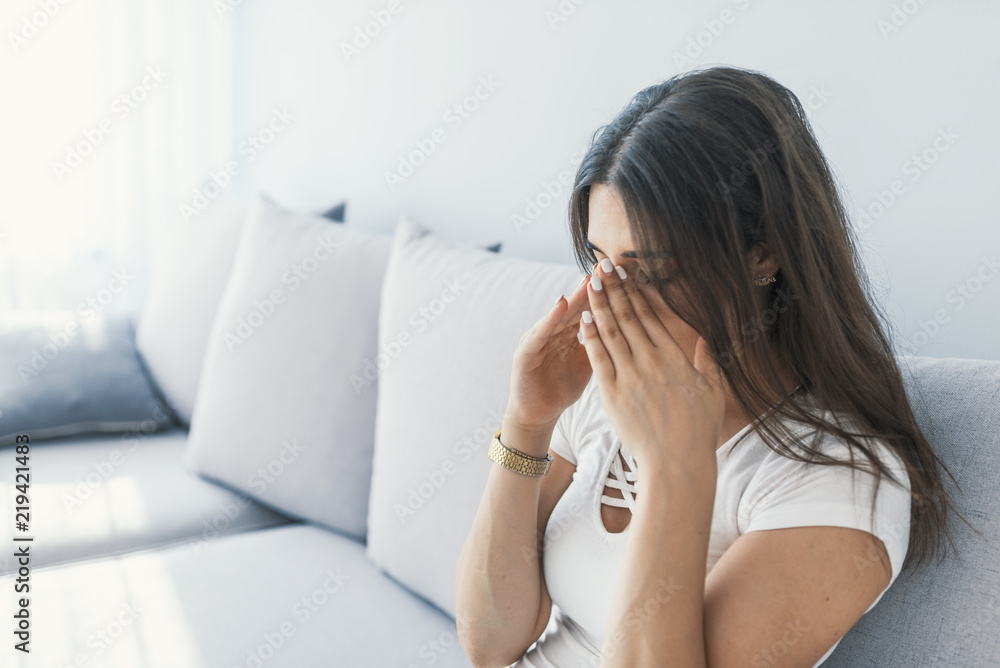 Woman with headache. Seasonal allergies and health problems. Sinus ache ...