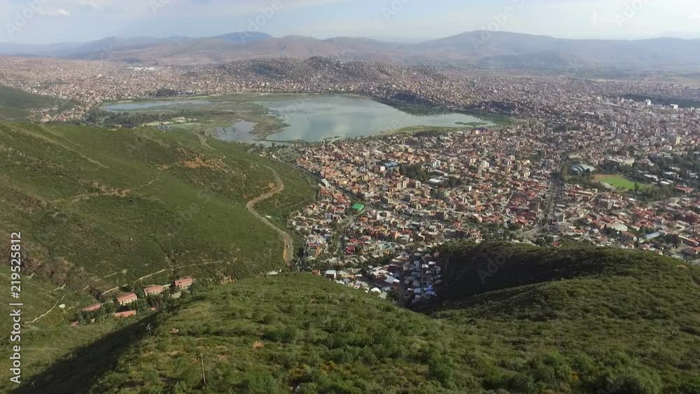 Laguna Alalay lake aerial drone view in Bolivia. Laguna Alalay is a ...