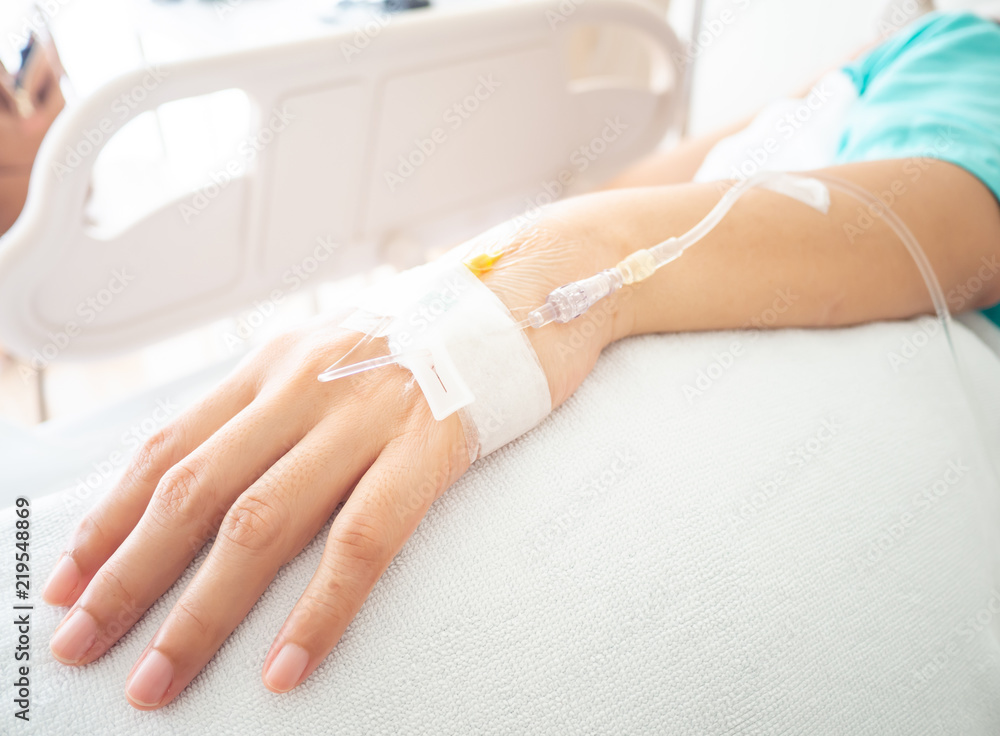 Close up hand of asia woman patient with intravenous catheter for ...