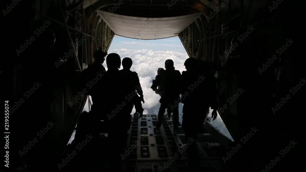 US Army paratroopers jumping from a military plane during special ...