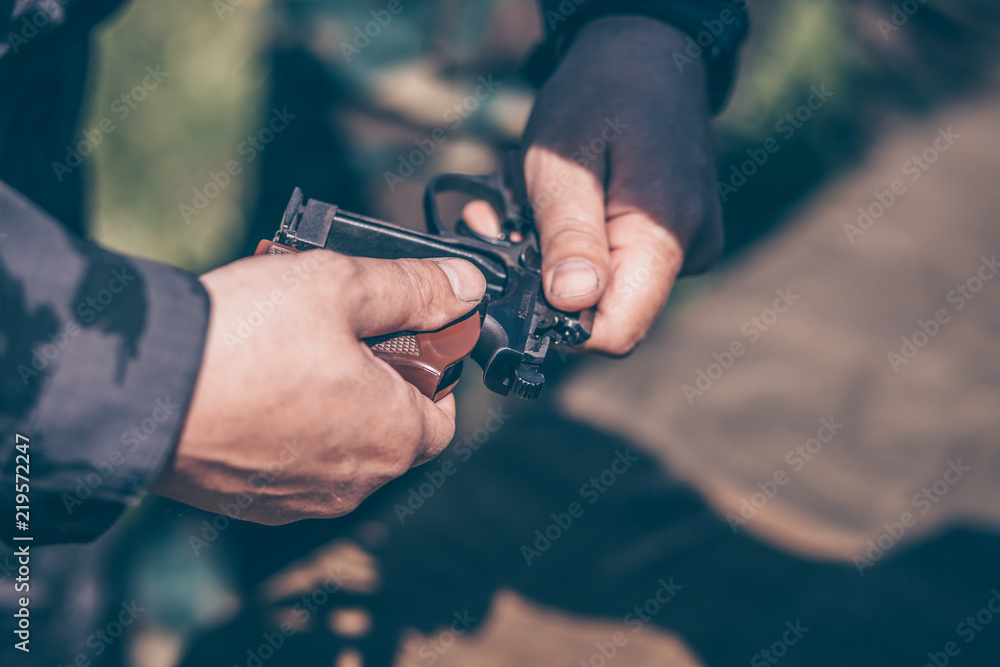 The instructor shows how to disassemble and assemble a Makarov pistol ...