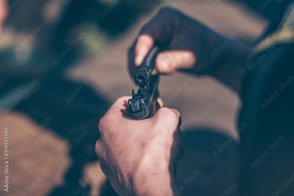 The instructor shows how to disassemble and assemble a Makarov pistol ...