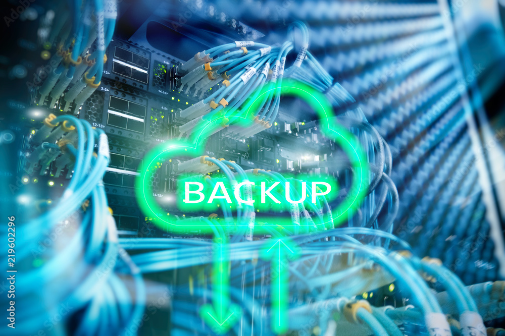 Backup button on modern server room background. Data loss prevention ...