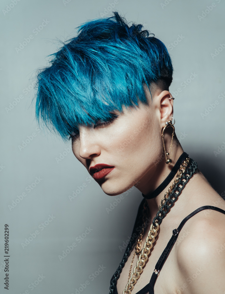 fashion photography of a girl with blue hair on a white background ...