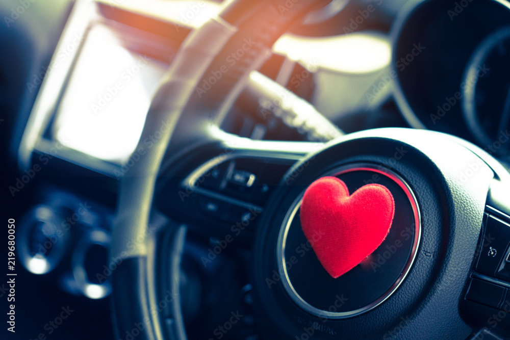Steering wheel with heart red object.Love car concept idea.interior ...