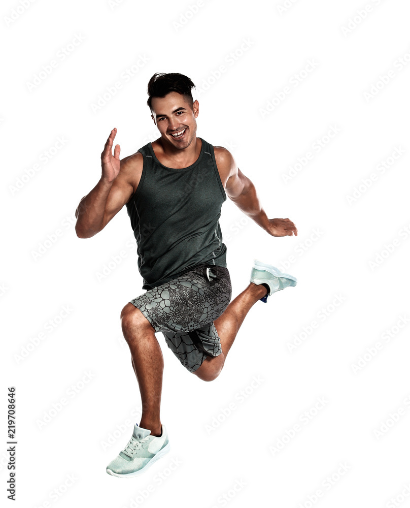 Handsome young man running on white background Stock Photo | Adobe Stock