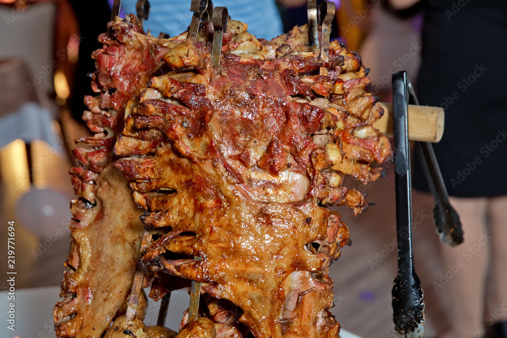 Many Cooking Traditional Turkish roasting lamb barbecues.Roasted meat ...