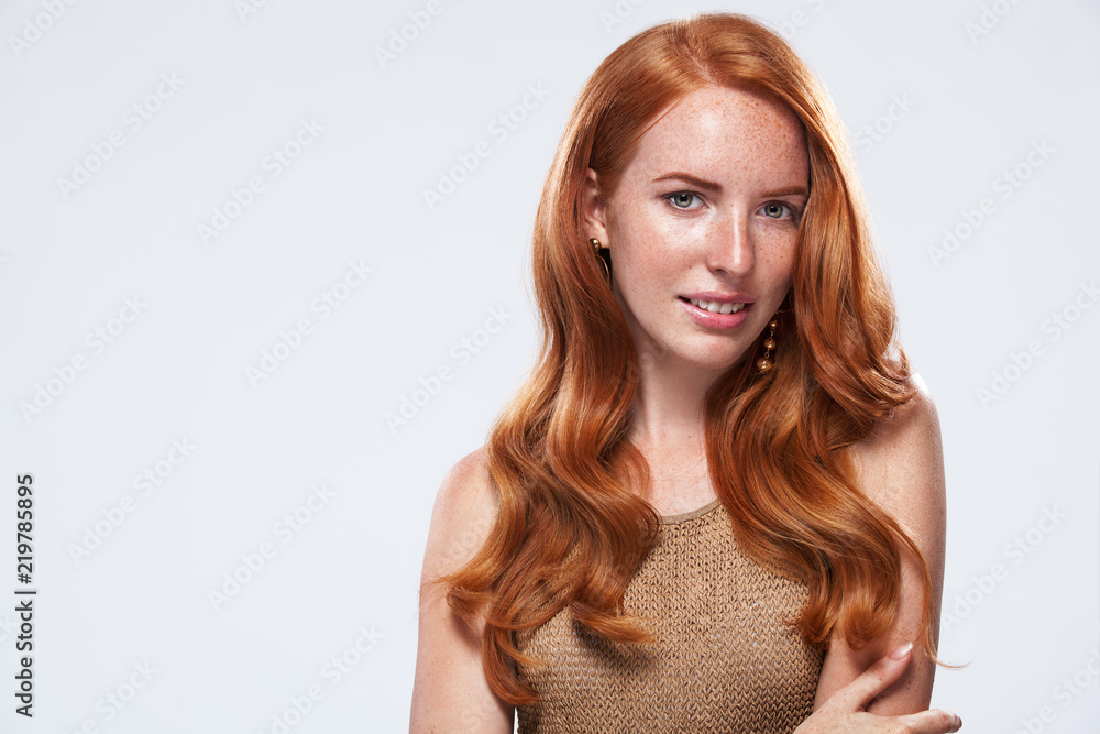 Red head girl with long and shiny wavy hair. Beauty. Beautiful model ...