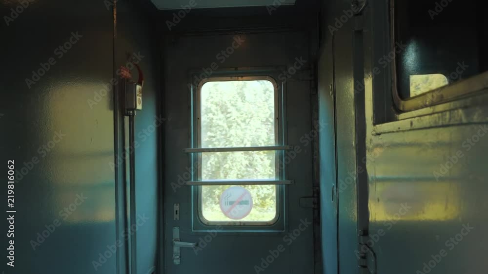 hall corridor inside the railway train car window light from the window ...
