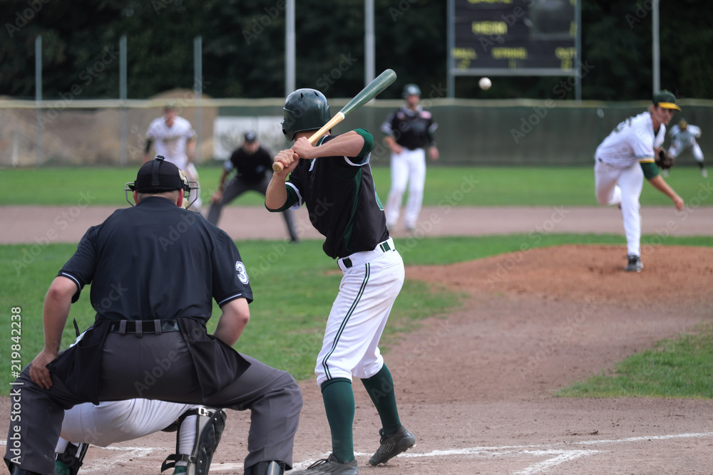 Baseball match with pitcher and batter and catcher and umpire ...