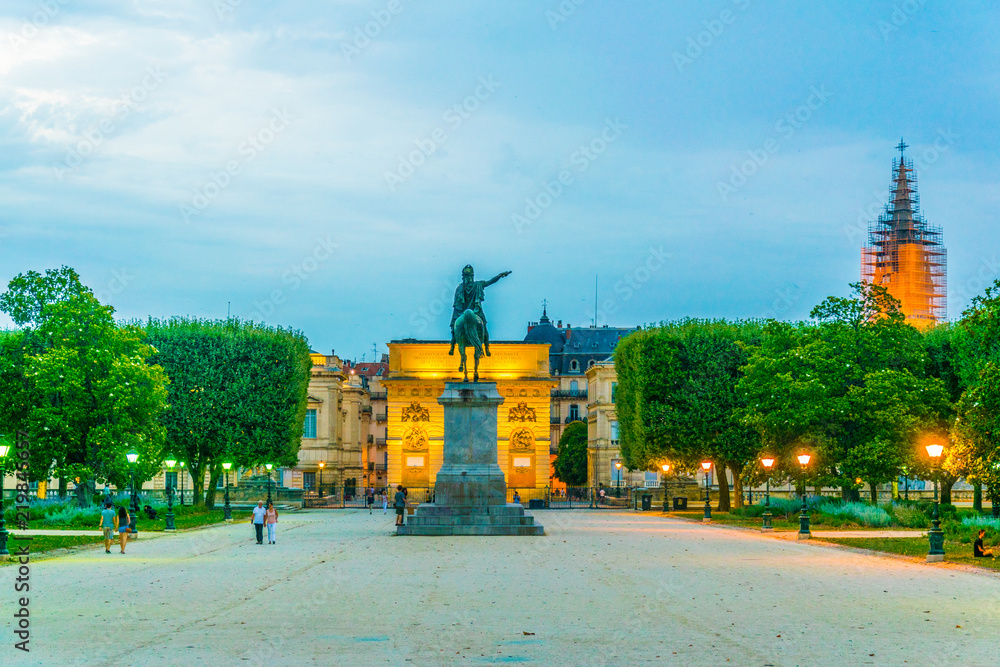 Sunset view of the Promenade du Peyrou dominated by the statue of king ...