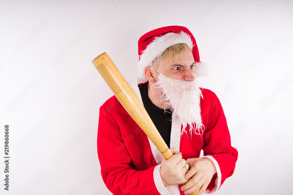 Santa Claus with a baseball bat, the concept of an evil Santa Claus for ...