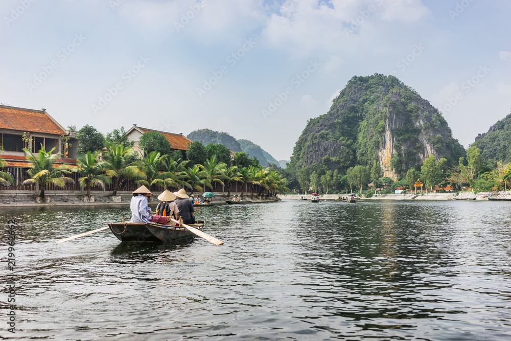 Boatride from Vung Tram Pier. Traditional paddle-boat trip lets the ...