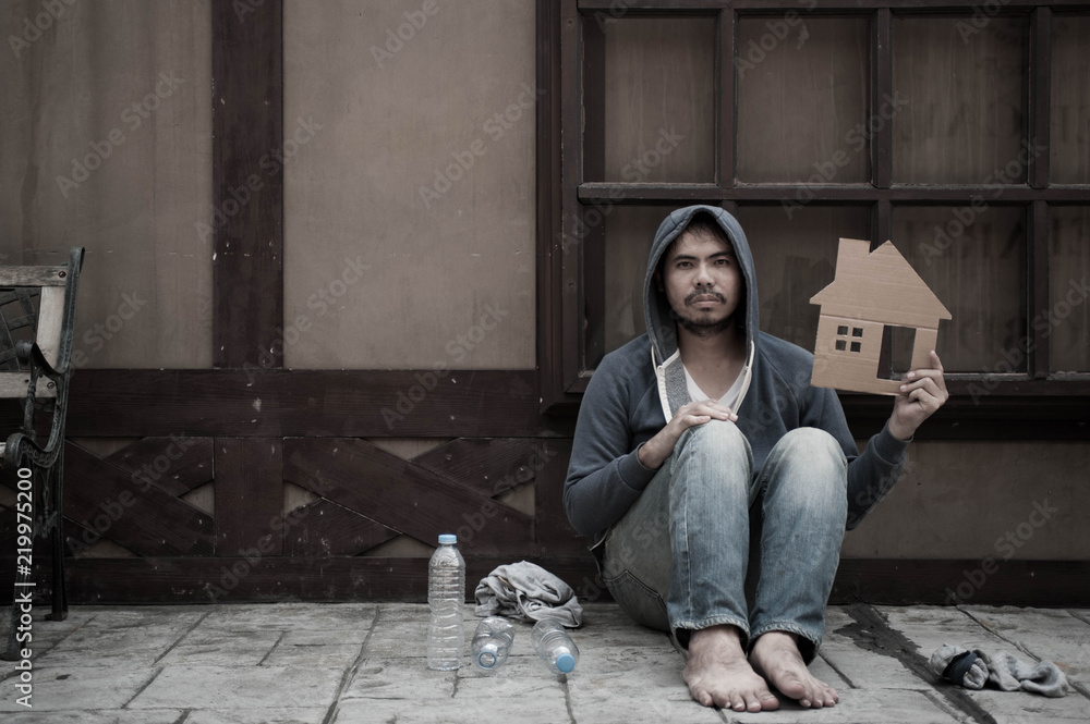 Homeless man showing a cardboard house for help, Dirty man loss home ...