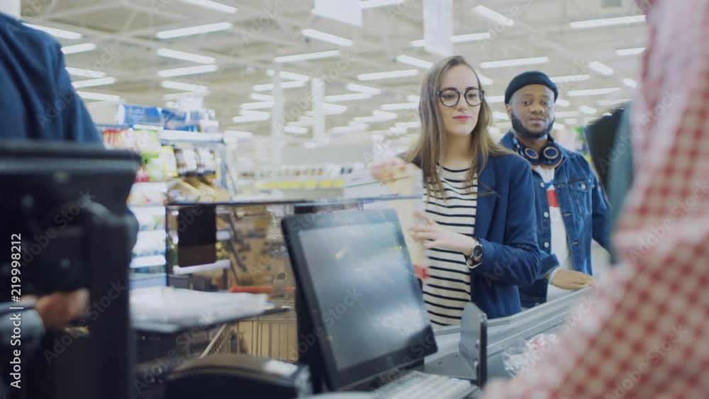 At the Supermarket: Checkout Counter Cashier Scans Groceries and Food ...