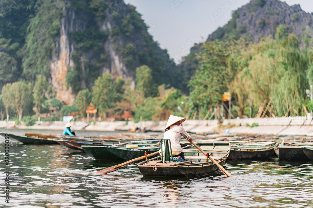 Boat ride from Vung Tram Pier. Traditional paddle-boat trip lets the ...