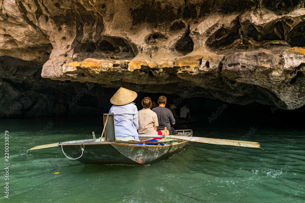 Boat ride from Vung Tram Pier. Traditional paddle-boat trip lets the ...