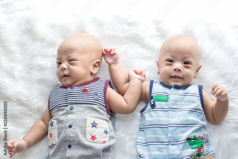 Cute Identical Twins Sleeping Babies