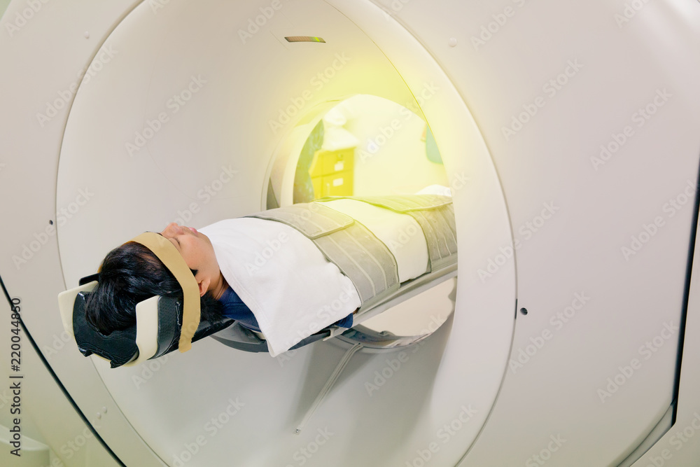 Process of CT scanning of an old patient. Man Receiving a Medical Scan ...