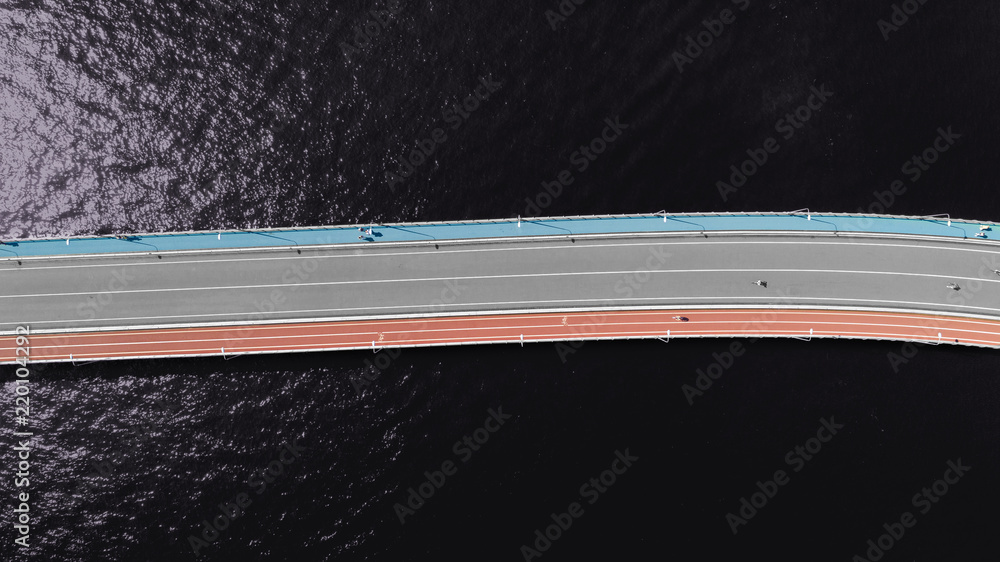 Aerial top view of pedestrian and cycling path lane on Park bridge in ...
