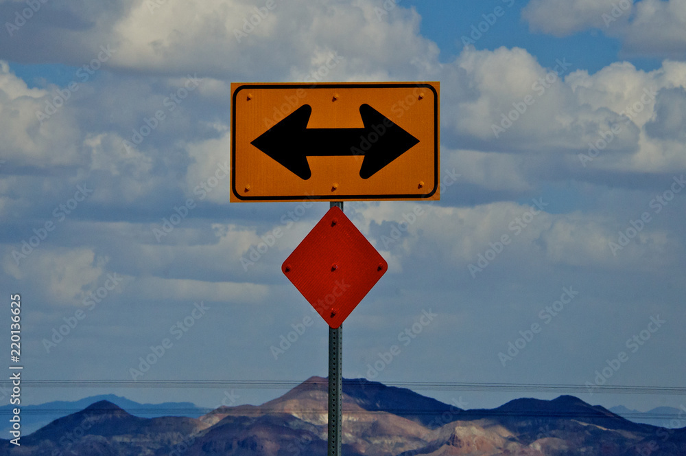 Stop. Which Way, left or right? Traffic sign with two arrows that ...