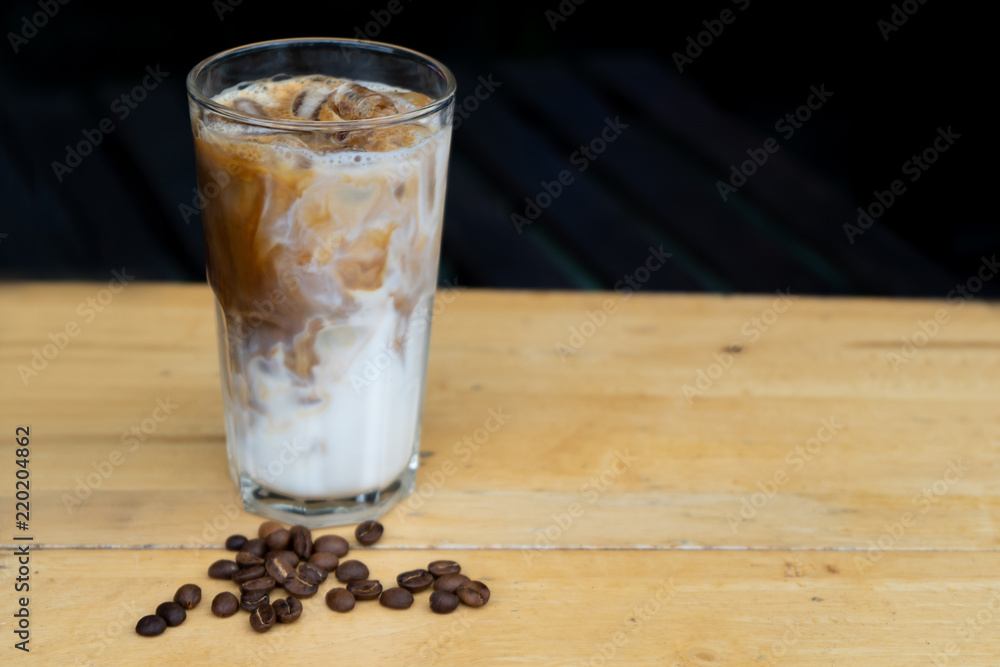 Close-up how to make ice latte coffee, ice latte on wood table Stock ...