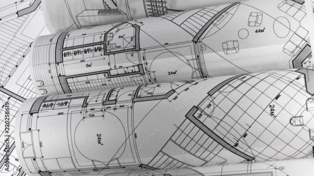 Blueprints - rolls of architectural drawings smoothly rotate on the ...