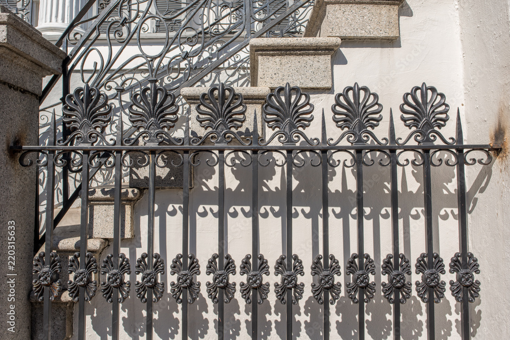 Beautiful, decorative iron fence at a historic home in the French ...