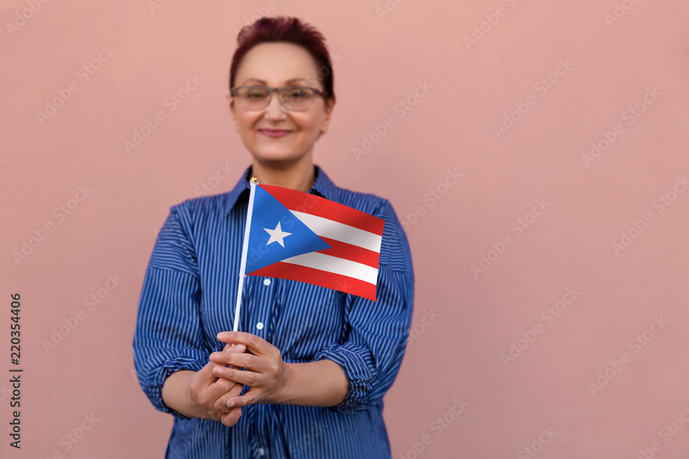 Puerto Rico flag. Woman holding Puerto Rico flag. Nice portrait of ...