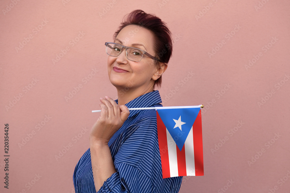 Puerto Rico flag. Woman holding Puerto Rico flag. Nice portrait of ...
